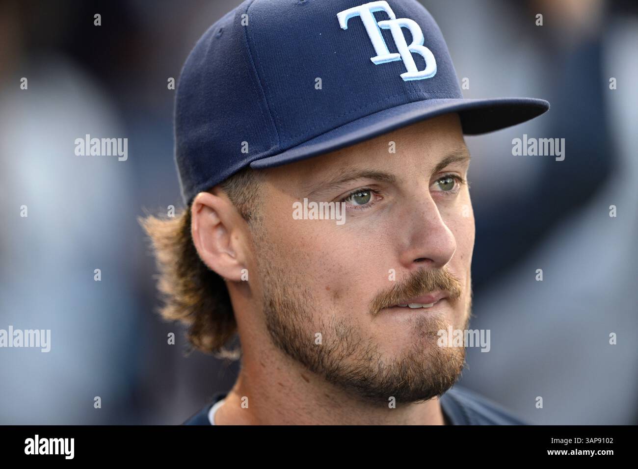 Tampa Bay Rays pitcher Mason Englert stands in the dugout before a ...