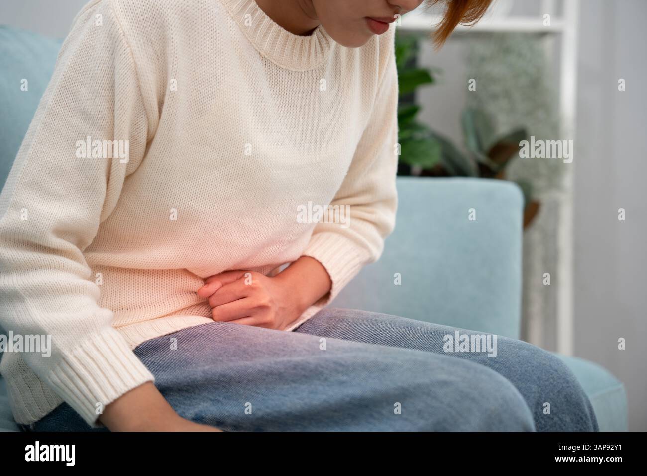 stomach ache. Asian women have abdominal pain, indigestion, gastritis ...