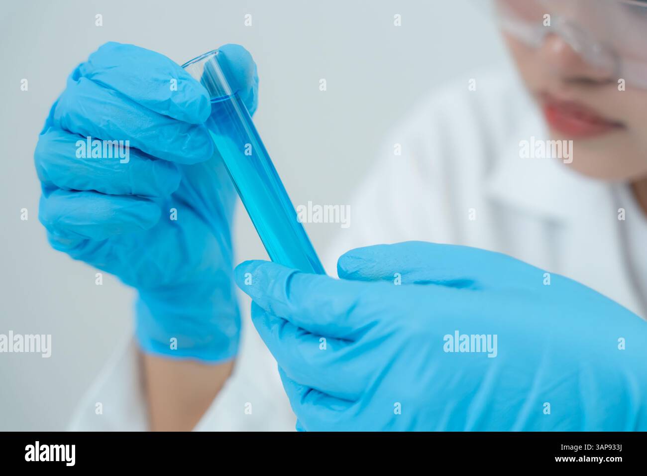 Scientist analyze biochemical sample in advanced scientific laboratory ...