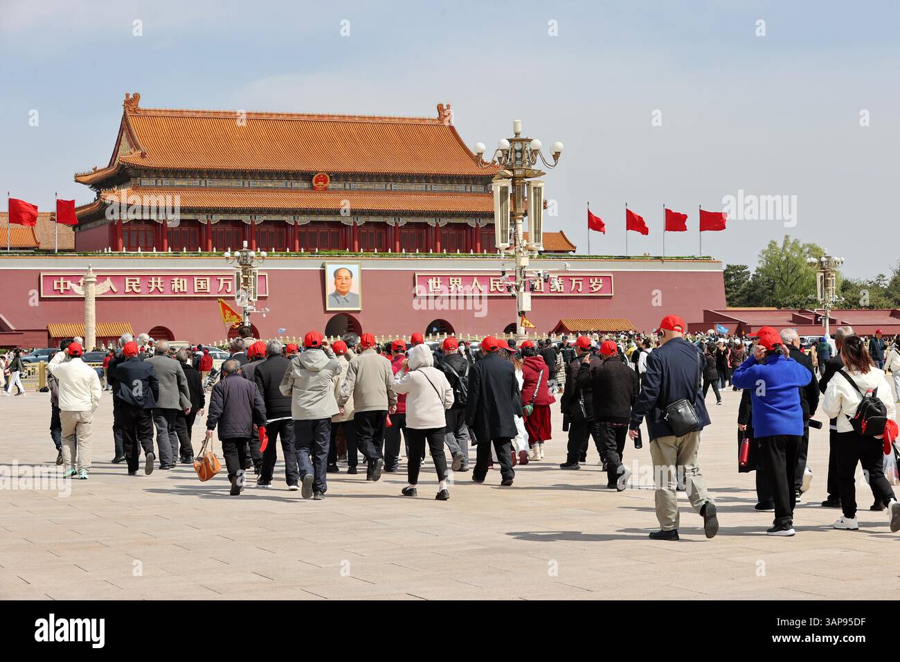 Tourists visit the Tiananmen Square in Beijing, China, 13 April, 2025 ...