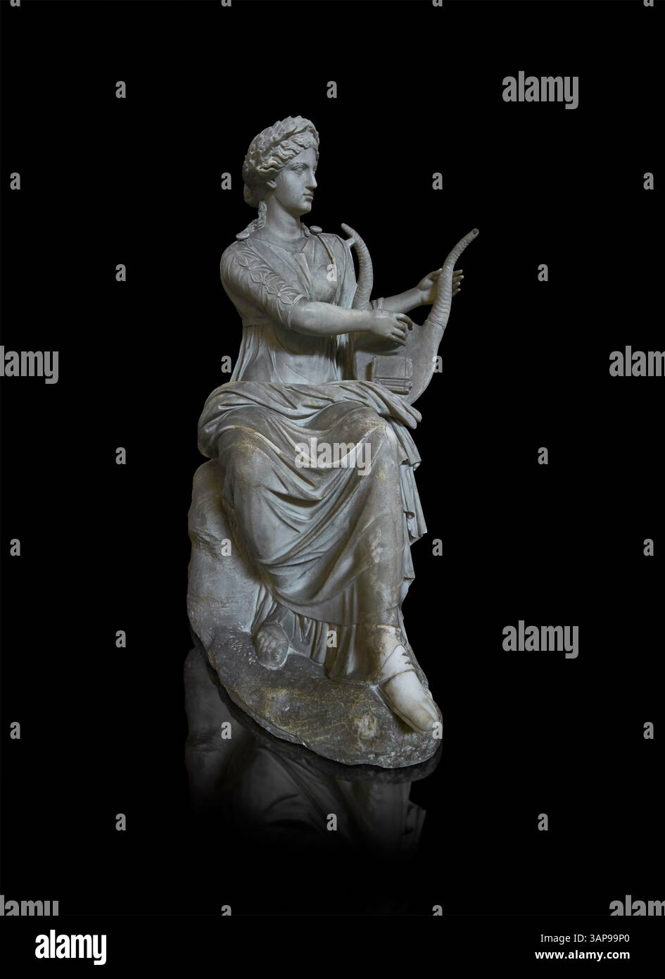 Roman statue of Terpsicore depicting the goddess seated playing a ...