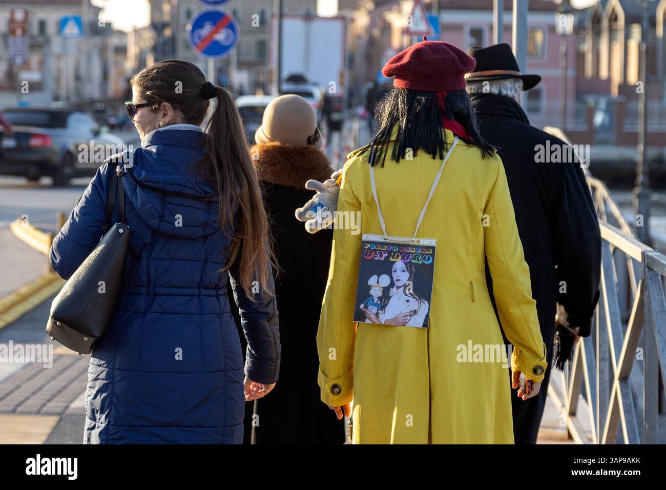 Chioggia, Italy – Mar 3rd, 2025: Pedestrian wearing a Lucio Corsi ...