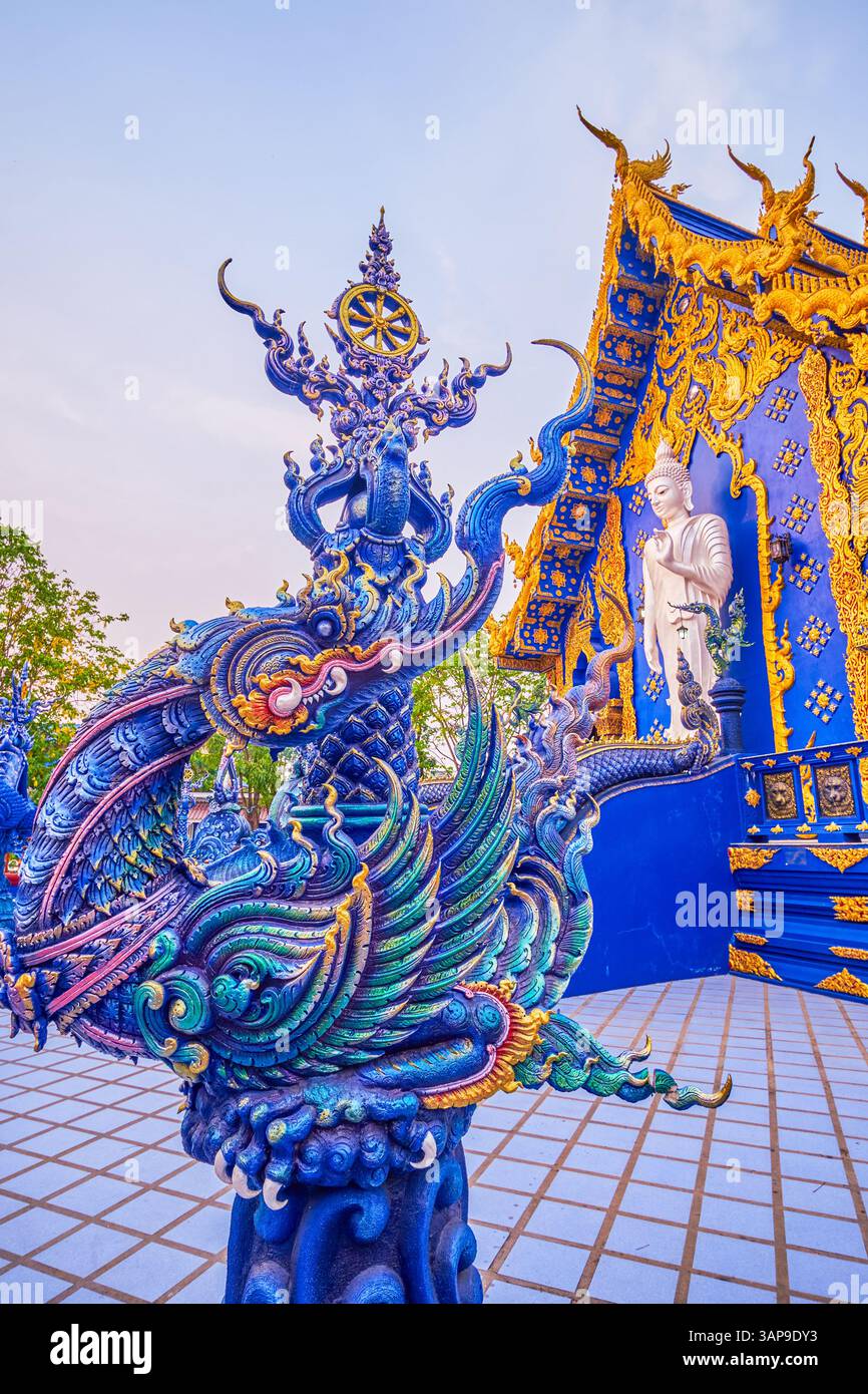 Blue ornate sculptures in the courtyard of Wat Rong Suea Ten (Blue ...