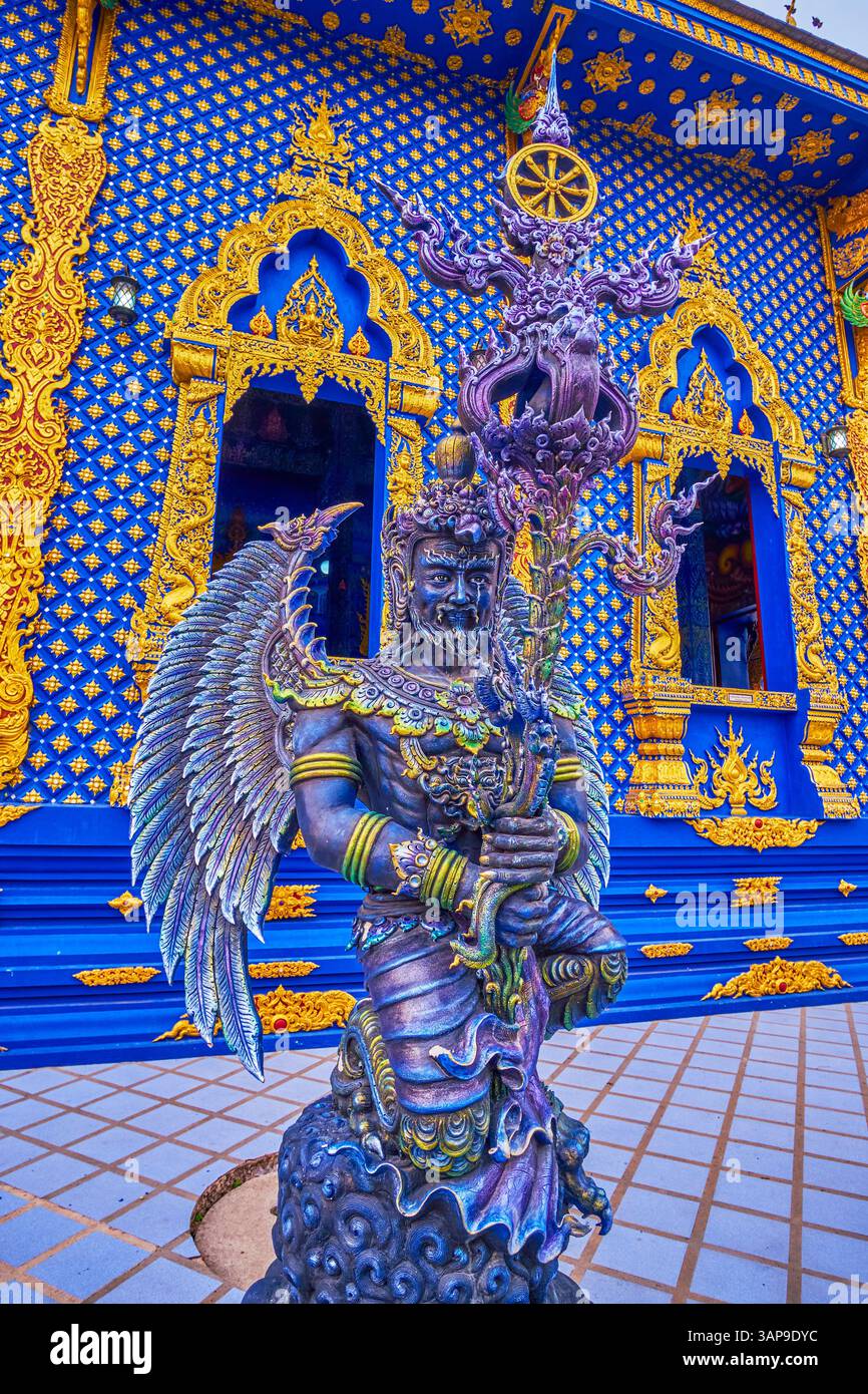 Blue-color Garuda-like statue at Ubosot of Wat Rong Suea Ten (Blue ...