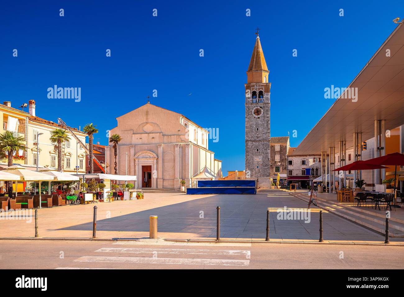 Umag. Scenic view of historic landmarks in town of Umag main square ...