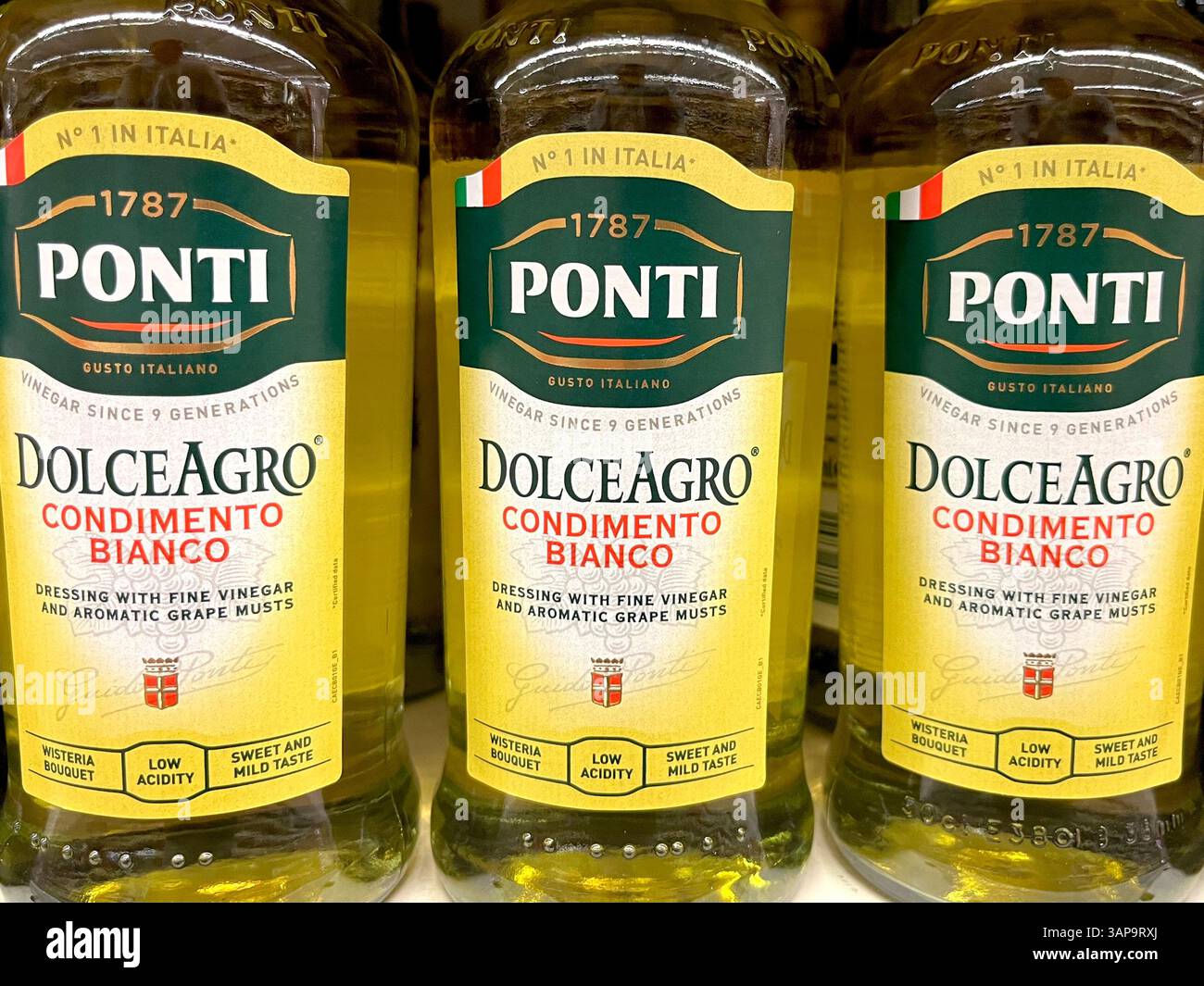 Bottles of Ponti DolceAgro white condiment, condimento bianco, placed ...