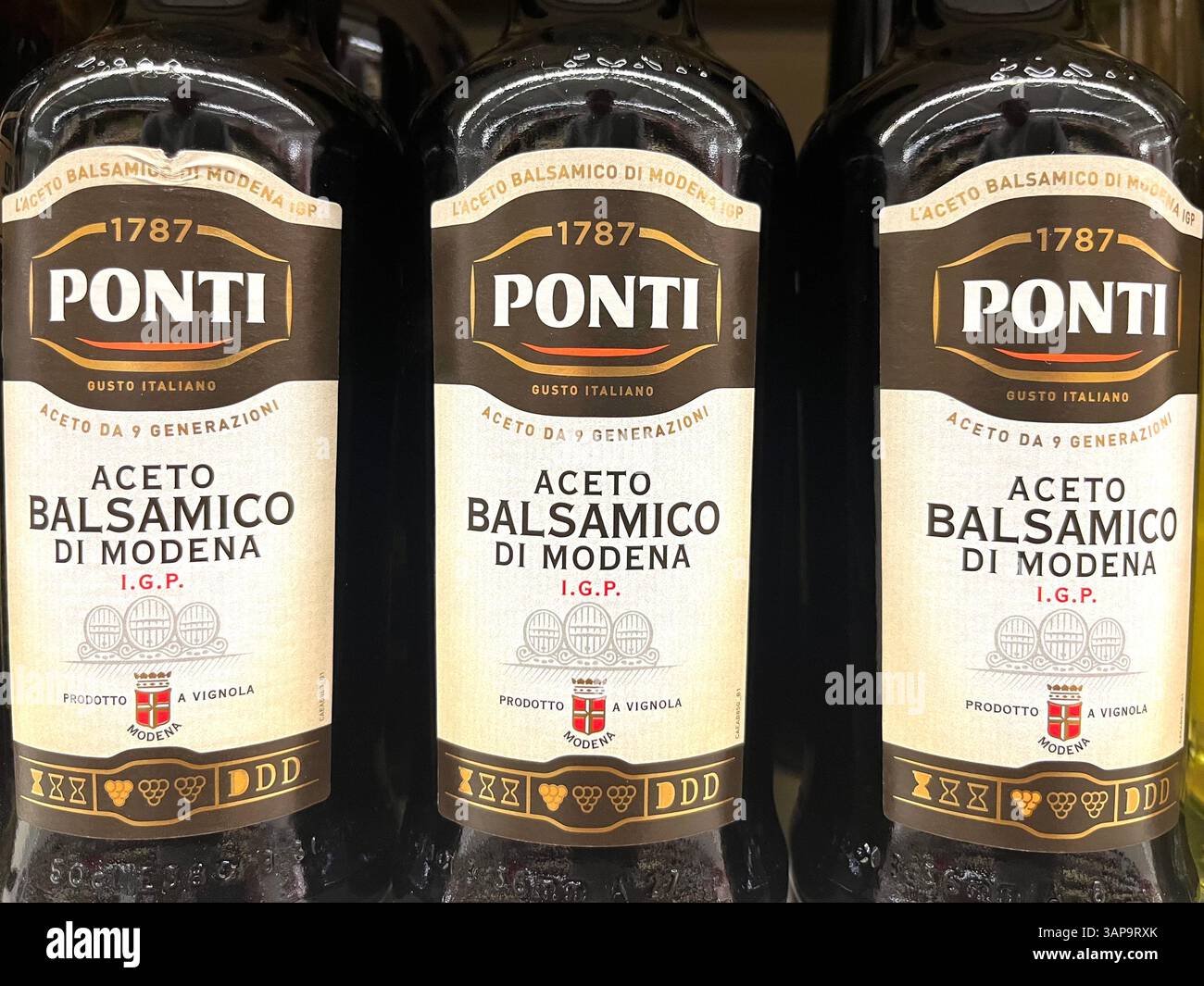 Bottles of Ponti Aceto Balsamico di Modena displayed on a supermarket ...