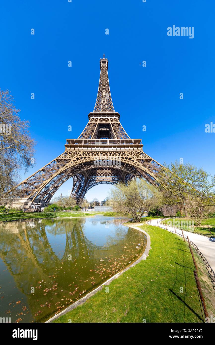 Paris, France - March 31, 2025: The Eiffel Tower shining twice, once in ...