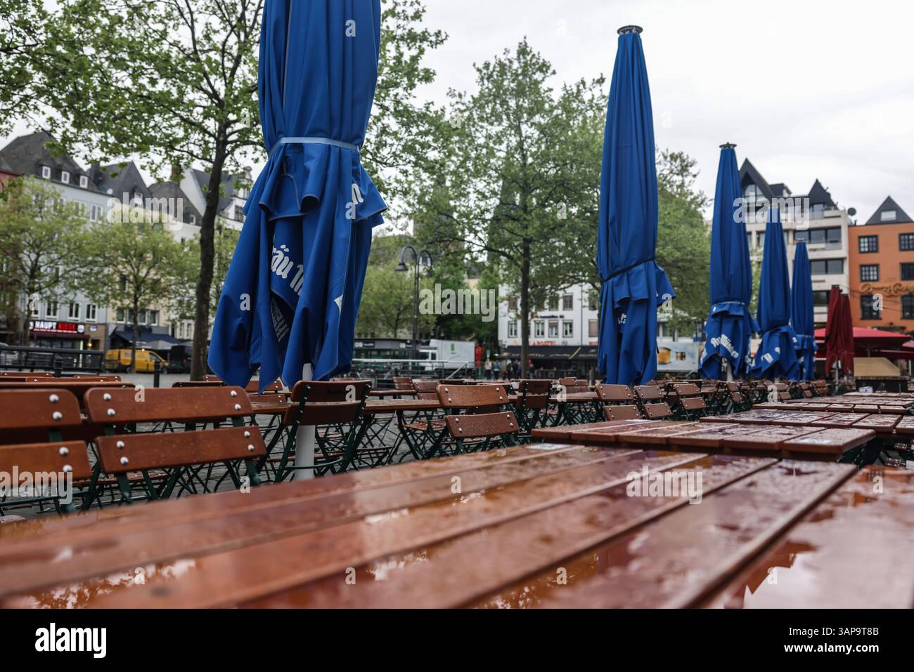 16 April 2025, North Rhine-Westphalia, Cologne: Tables and chairs in ...