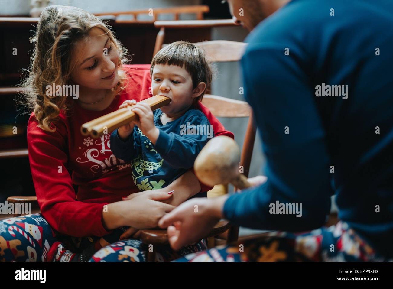Family Enjoying Quality Time While Exploring Musical Instruments ...