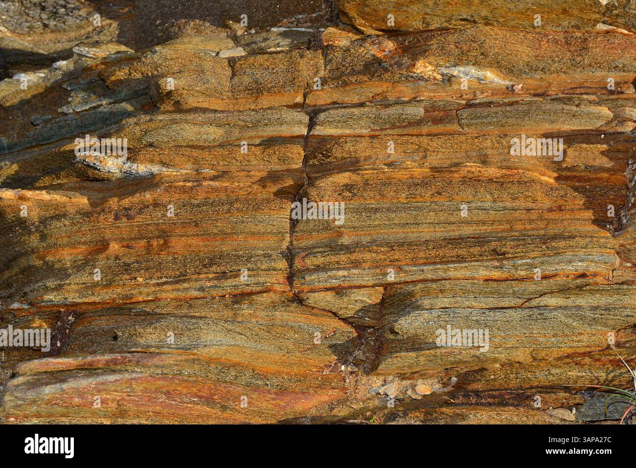 Sedimentary rocks stratified between sandstone layers Stock Photo - Alamy