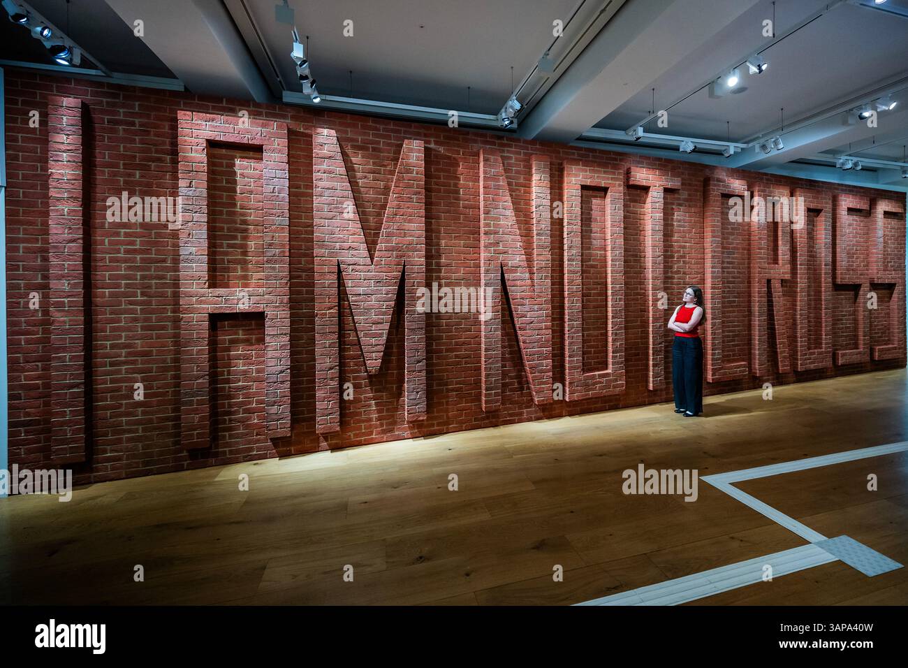 London, UK. 16th Apr, 2025. ‘NOT CROSS', 2025, a large-scale wall-based ...