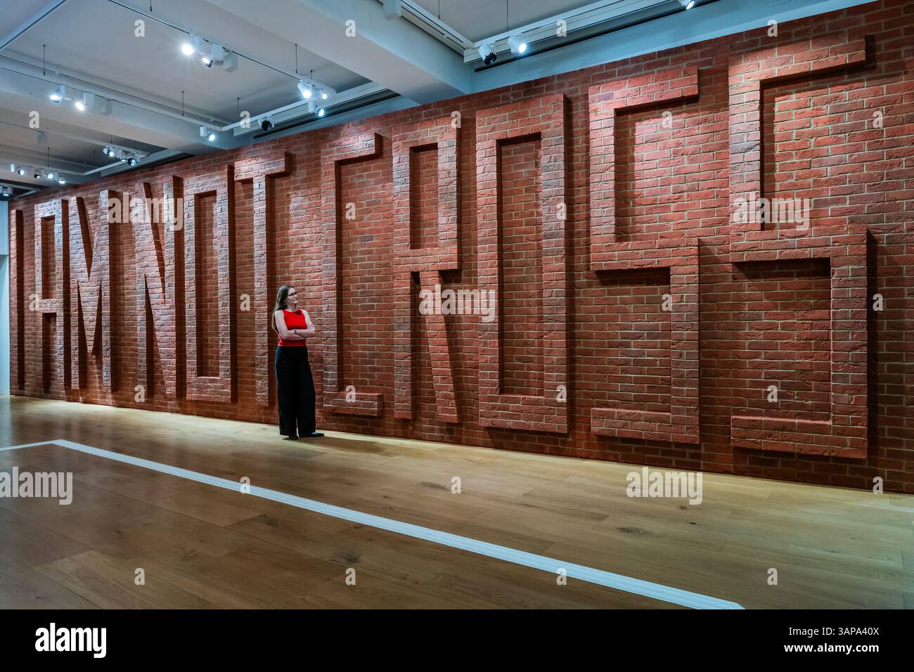 London, UK. 16th Apr, 2025. ‘NOT CROSS', 2025, a large-scale wall-based ...