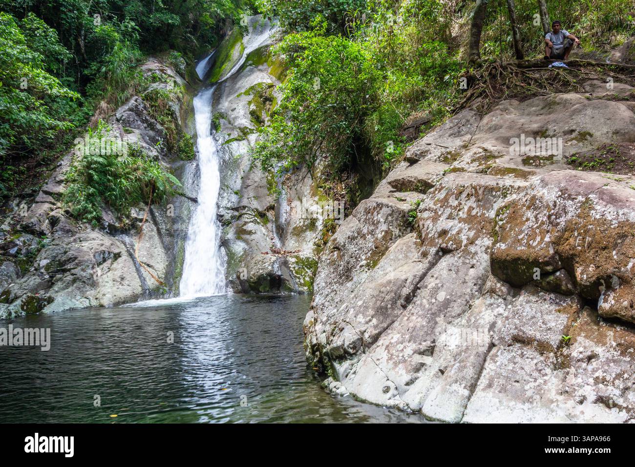A hidden waterfall surrounded by lush greenery in Pili, Camarines Sur ...