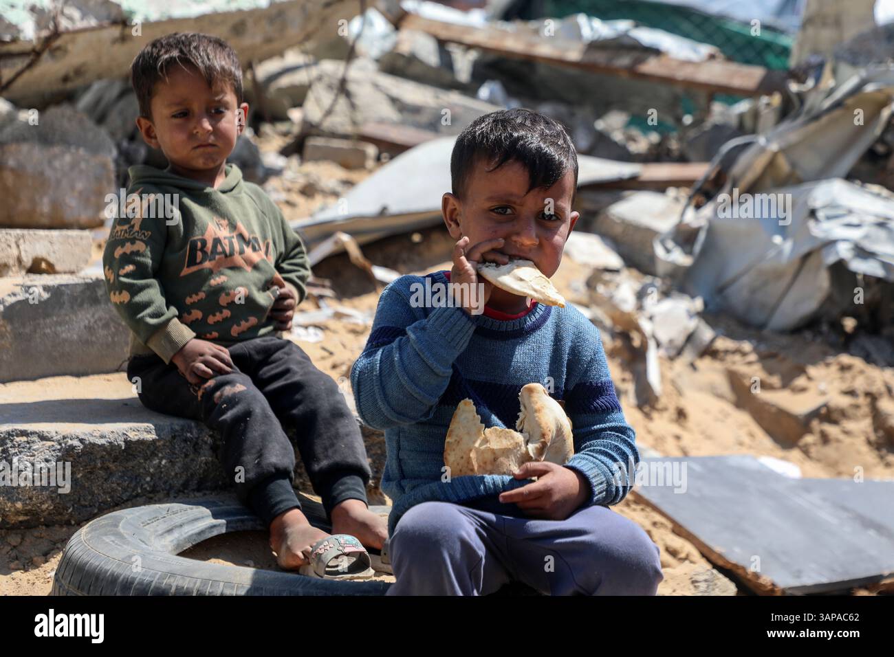Gaza. 15th Apr, 2025. Displaced Palestinian children are seen at a ...