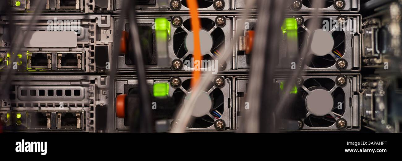 Website header shot of complex server rack with various wires and ...
