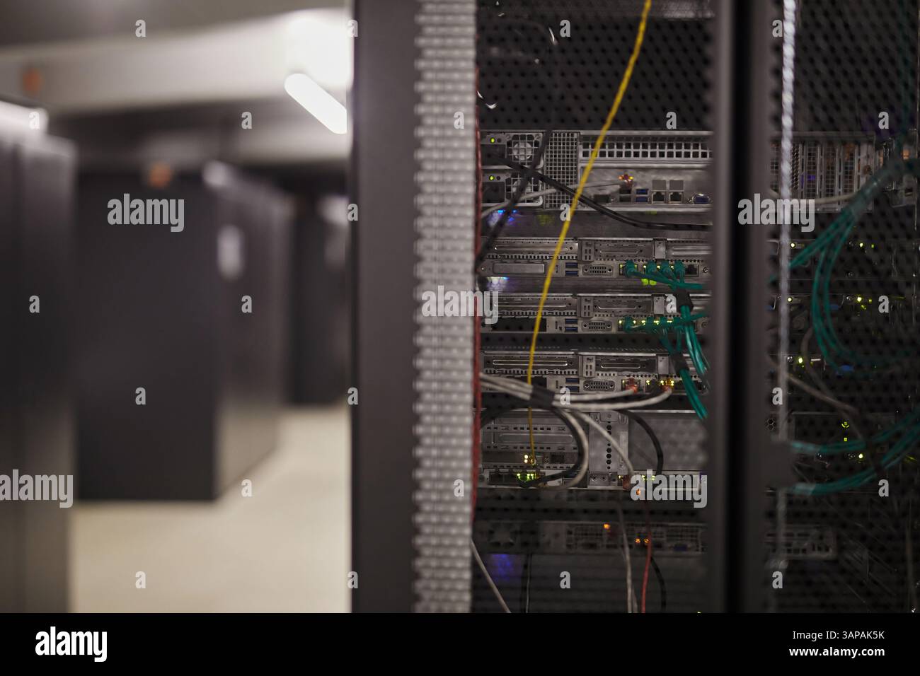 Displaying intricate wiring of server rack inside modern data center ...