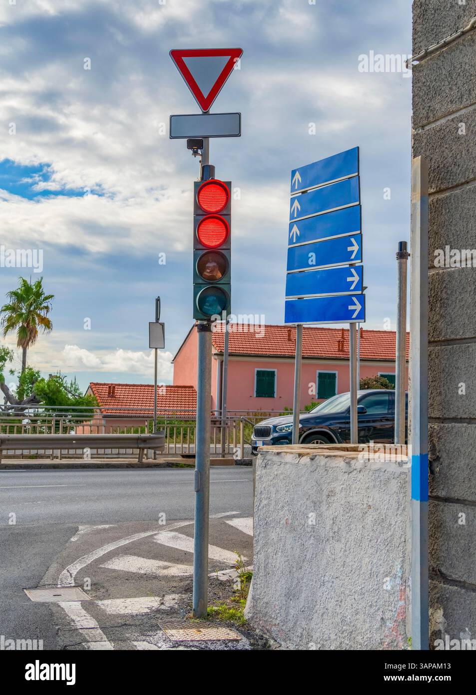 Double red traffic light seen in northern Italy Stock Photo - Alamy