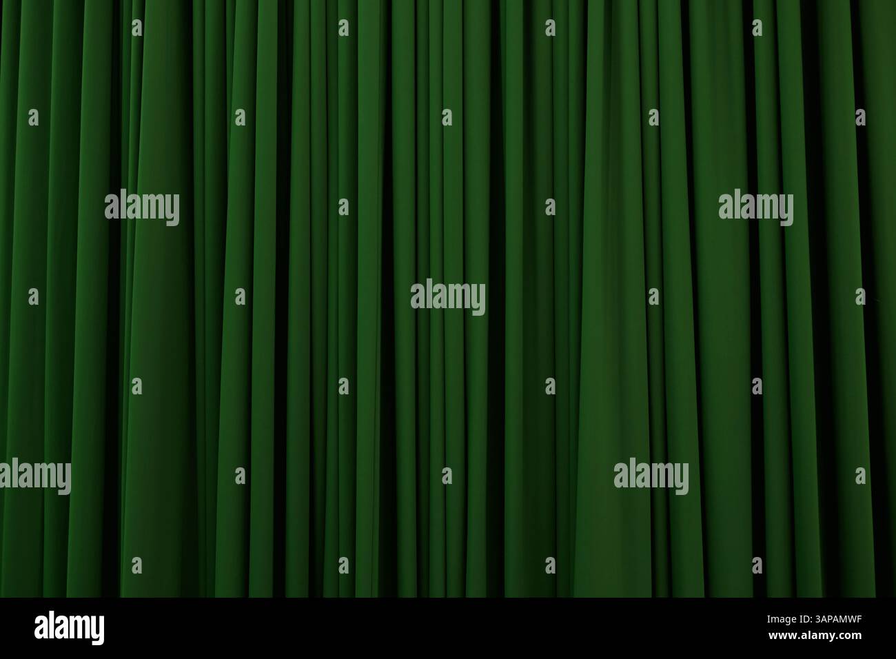 Irish green curtain with many folds background texture Stock Photo - Alamy