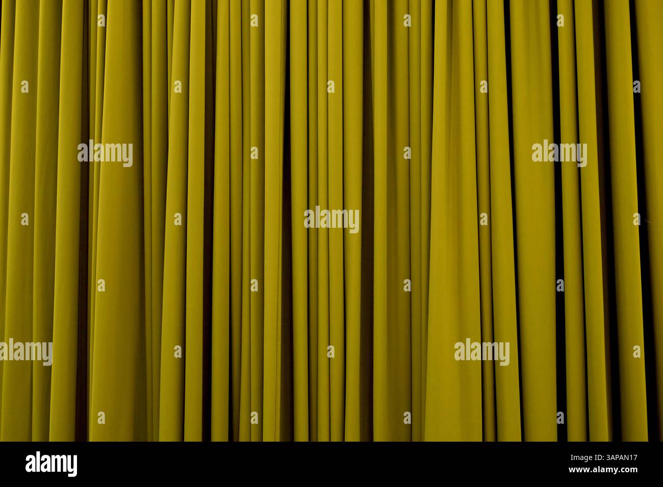 Light yellow curtain with many folds background texture Stock Photo - Alamy