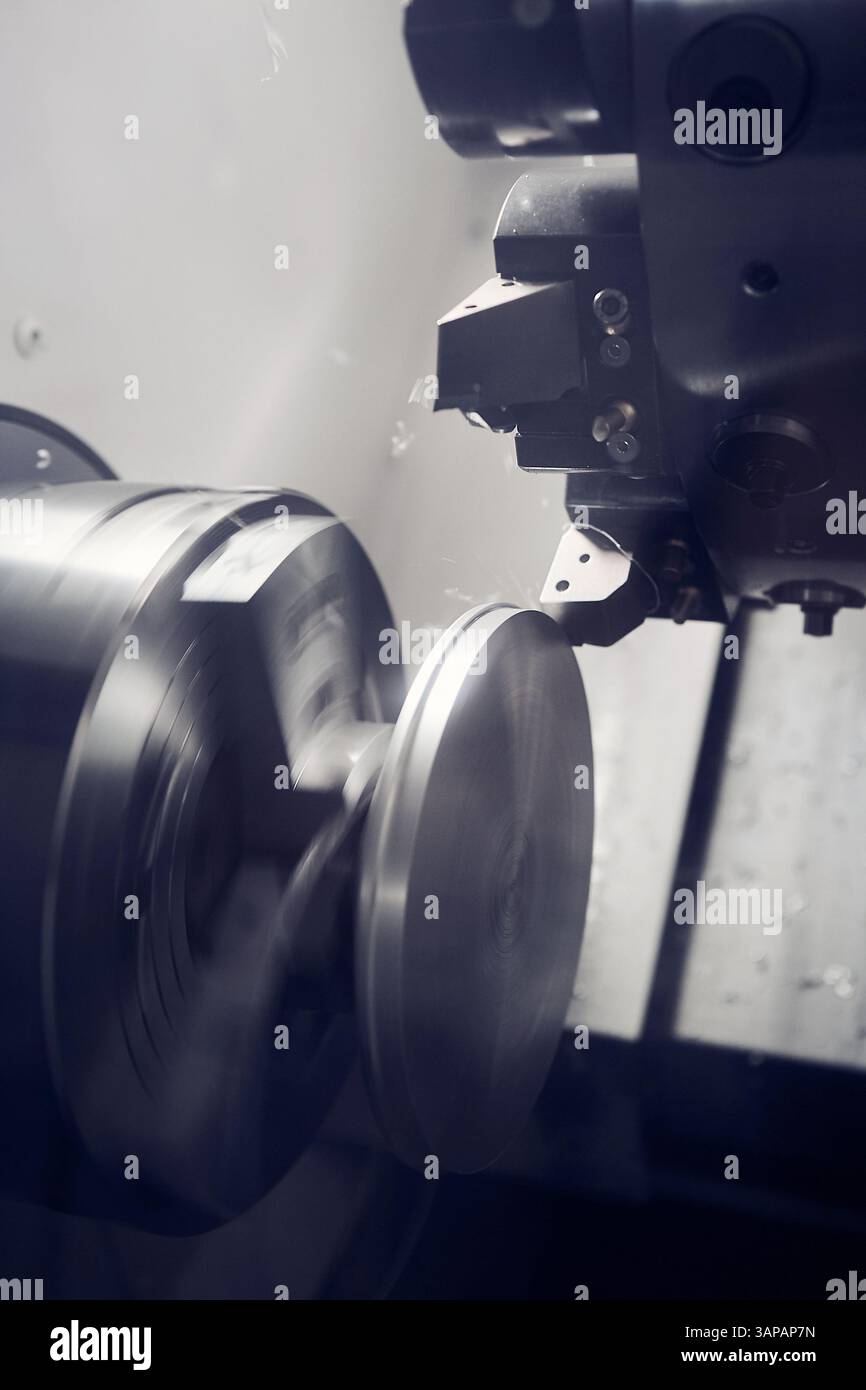 Cutting groove of turning and milling machine on a metal shaft. High ...