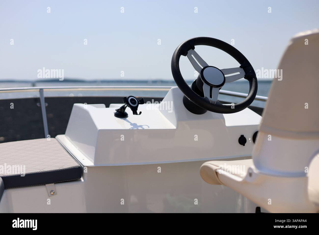 Luxurious motorboat flybridge steering wheel Stock Photo - Alamy