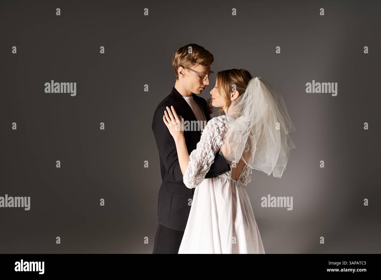 Joyful couple embraces celebrating hi-res stock photography and images ...