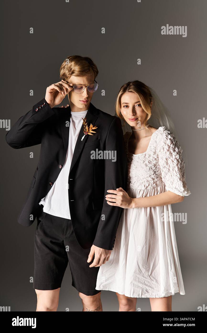 A radiant bride in a flowing white dress embraces her groom ...