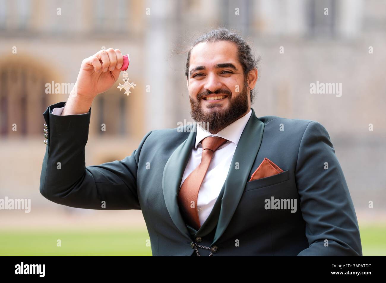 Dimitri Coutya after being made a Member of the Order of the British ...