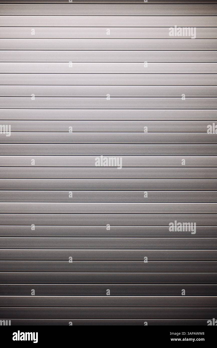 Corrugated metal sheet forming a striped background with horizontal ...
