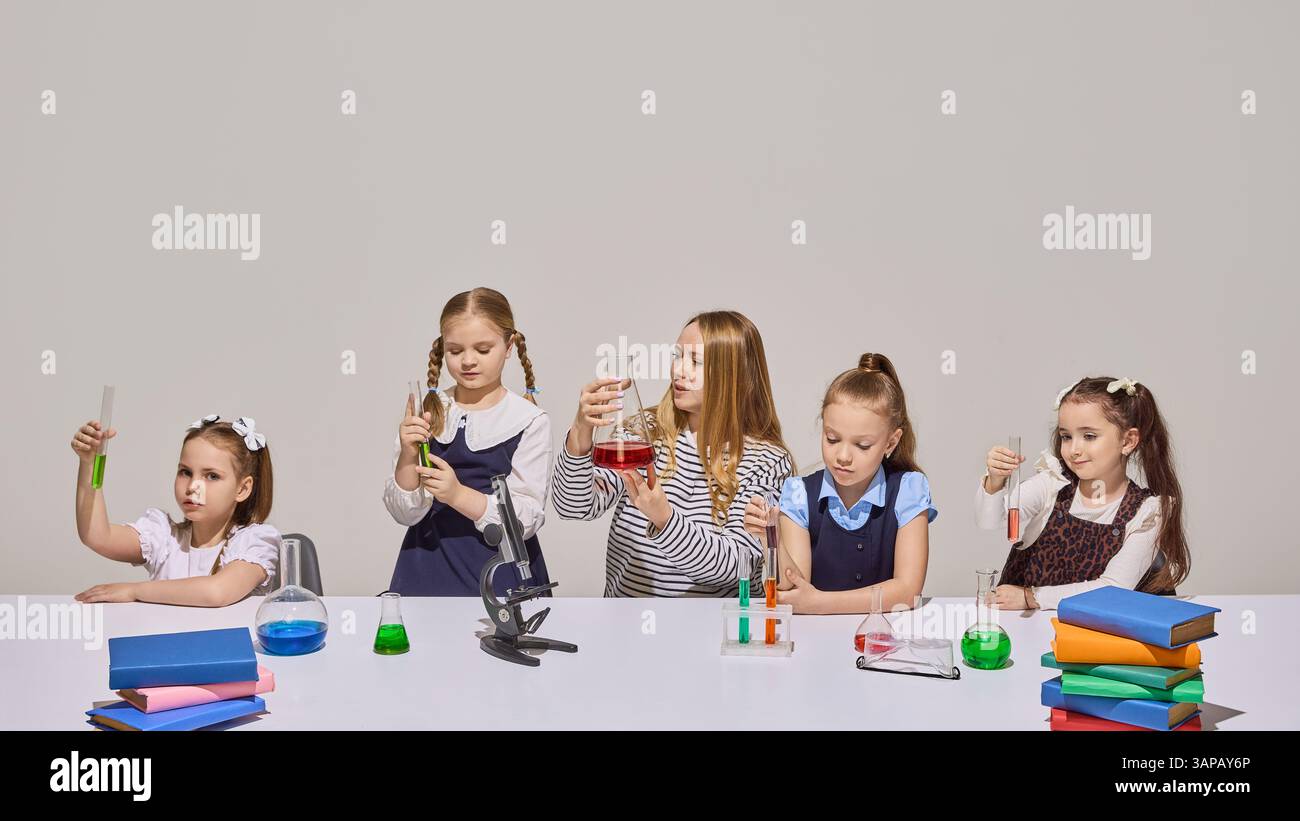 Children conduct experiment in hi-res stock photography and images - Alamy