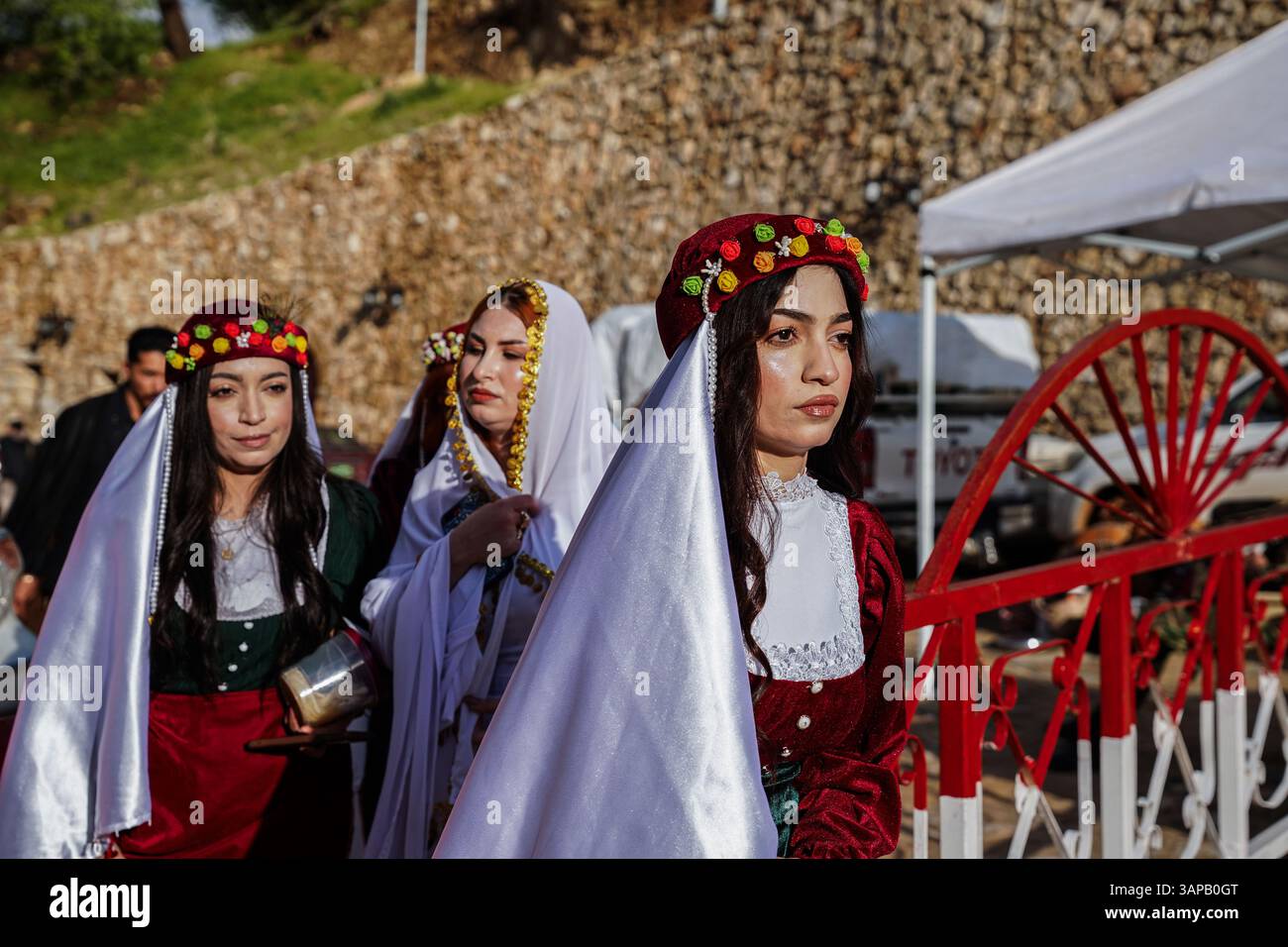 Iraqi Yazidi women wear traditional customs gather at Lalish mountain ...