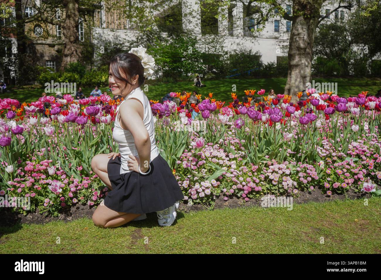 London UK 16 April 2025. People admire a the vibrant colours of tulips ...