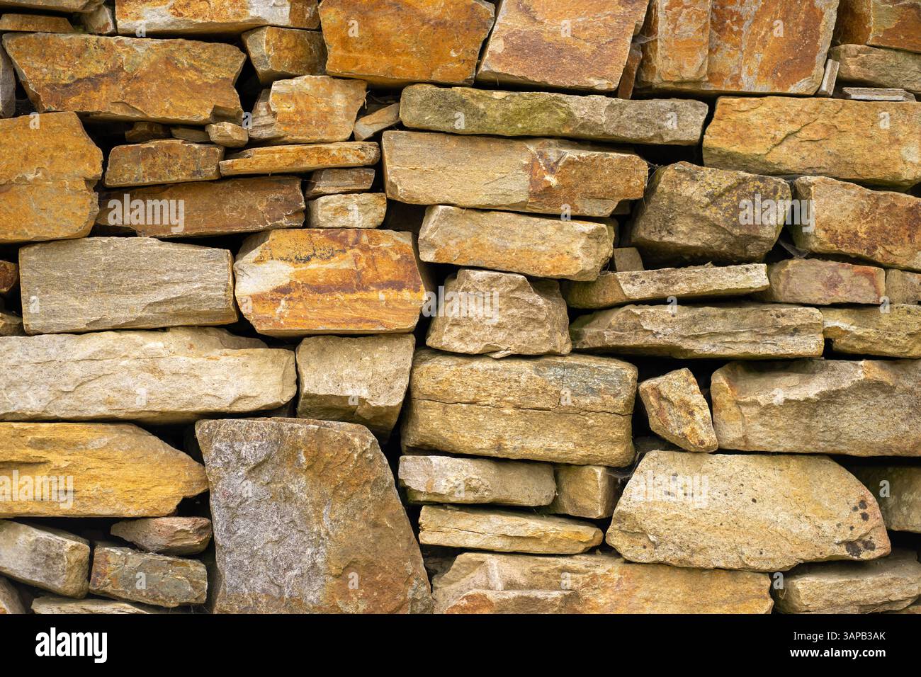 View of the brickwork. View of a brick fence made from many different ...
