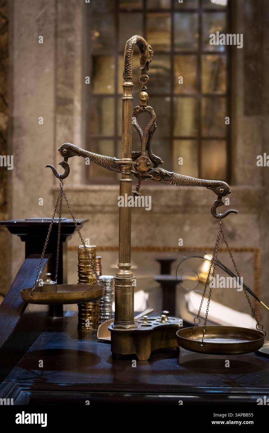 A set of scales on the counter at Gringotts Wizarding Bank, Harry ...