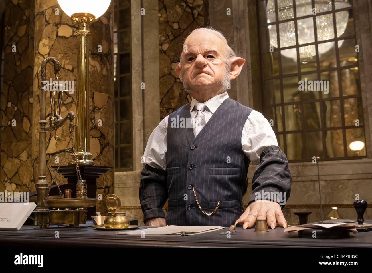 A bank teller at work in Gringotts Wizarding Bank, Harry Potter and the ...