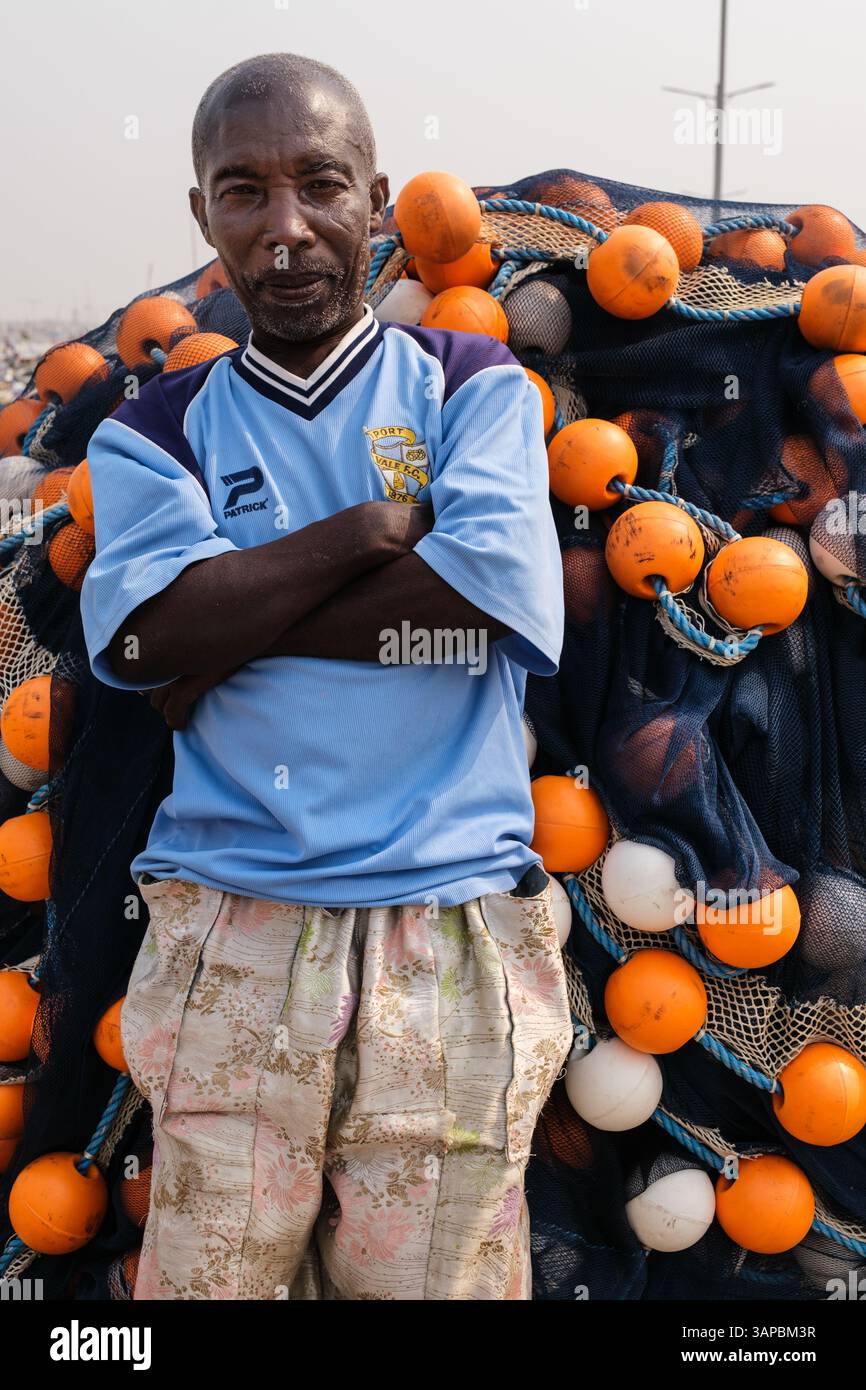 Accra, Ghana. Jamestown Fishing Harbor. Fisherman Standing by his ...