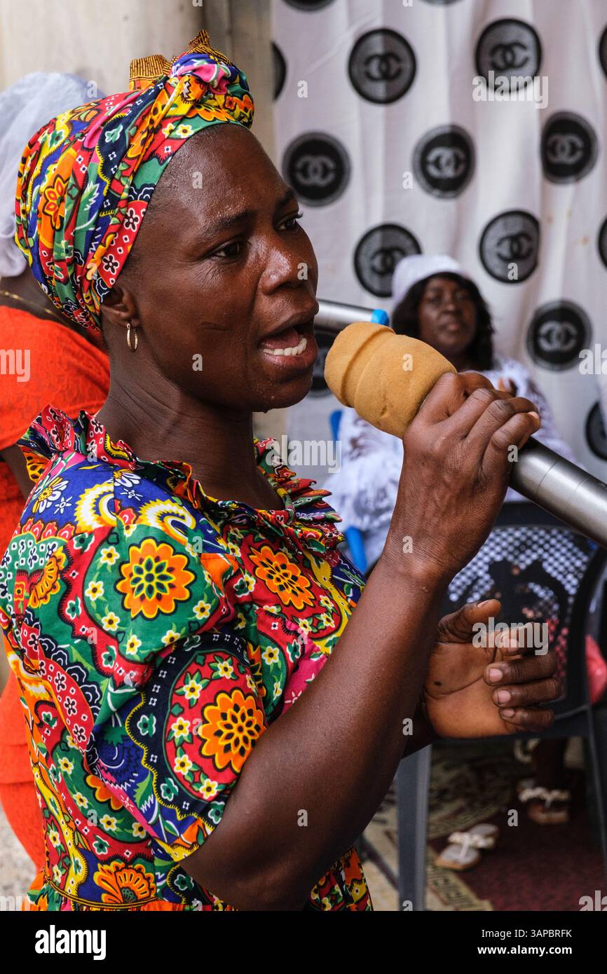 Accra, Ghana. Jamestown Neighborhood. Woman Singing at Sunday Afro ...