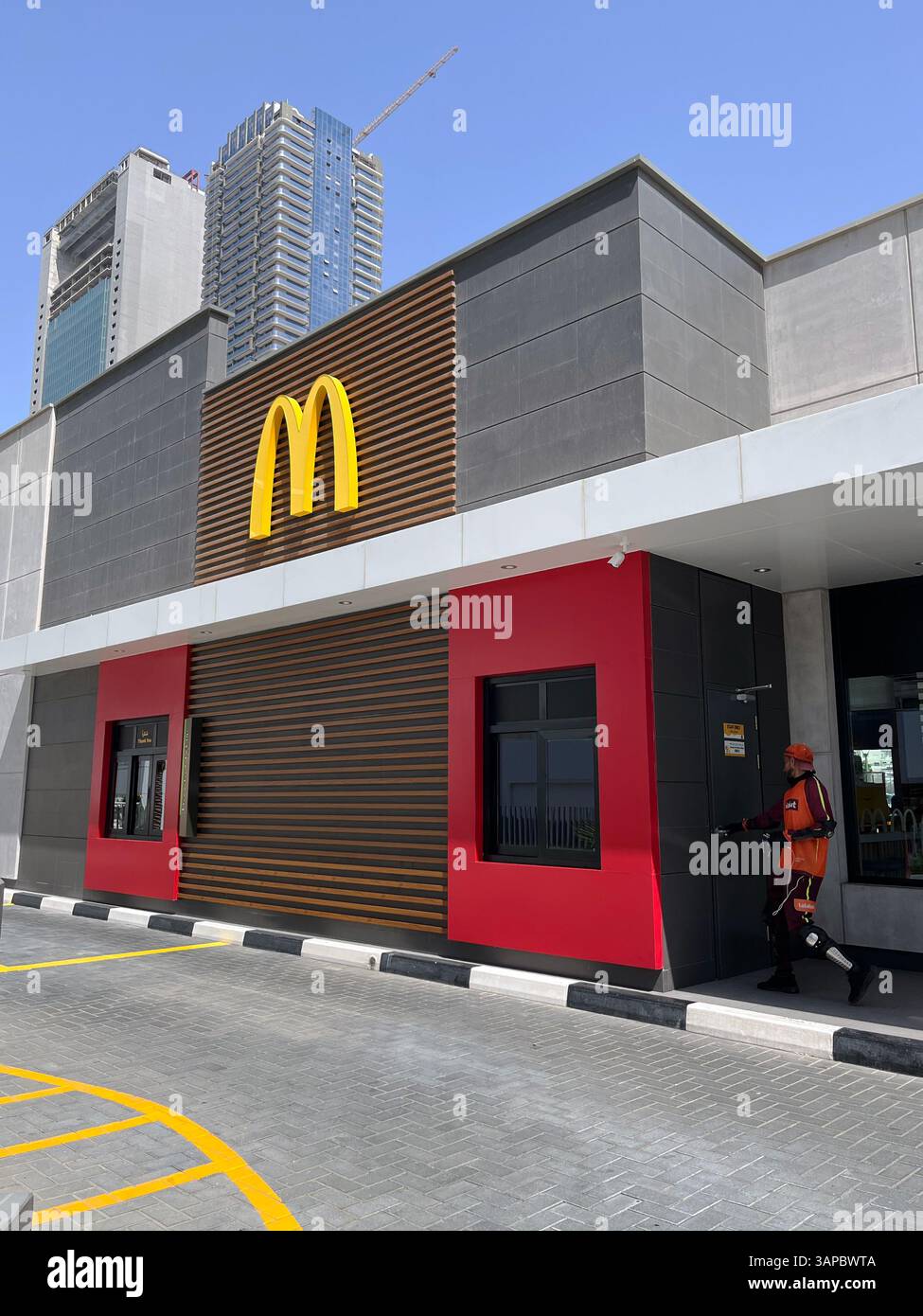 Modern McDonald's Drive-Thru Exterior with Urban Backdrop. Dubai,UAE ...