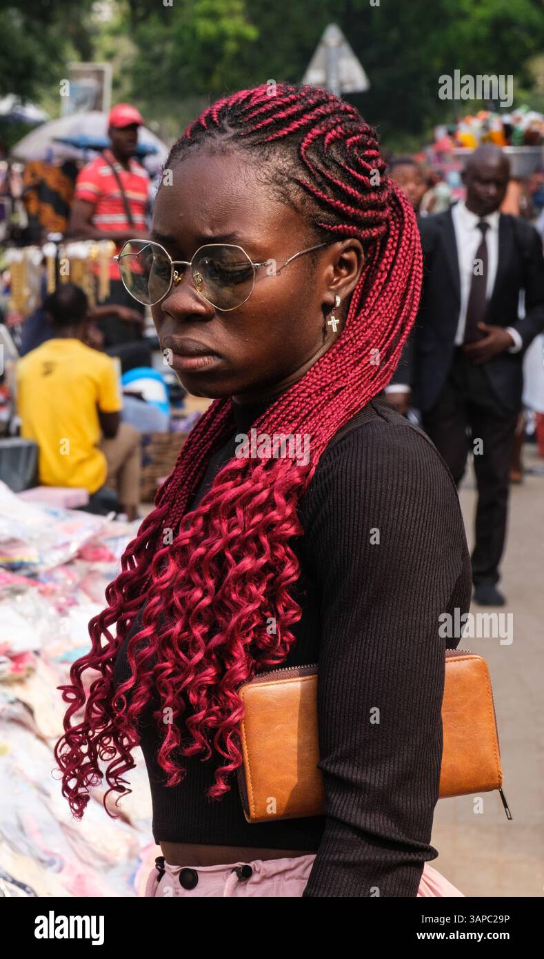Accra, Ghana. Makole Market. Woman with Long Red Hair Extensions Stock ...