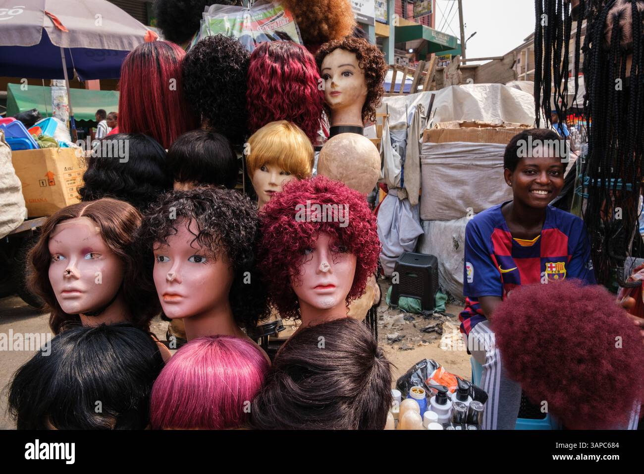 Accra, Ghana. Makole Market. Vendor Selling Wigs and Hair Pieces Stock ...