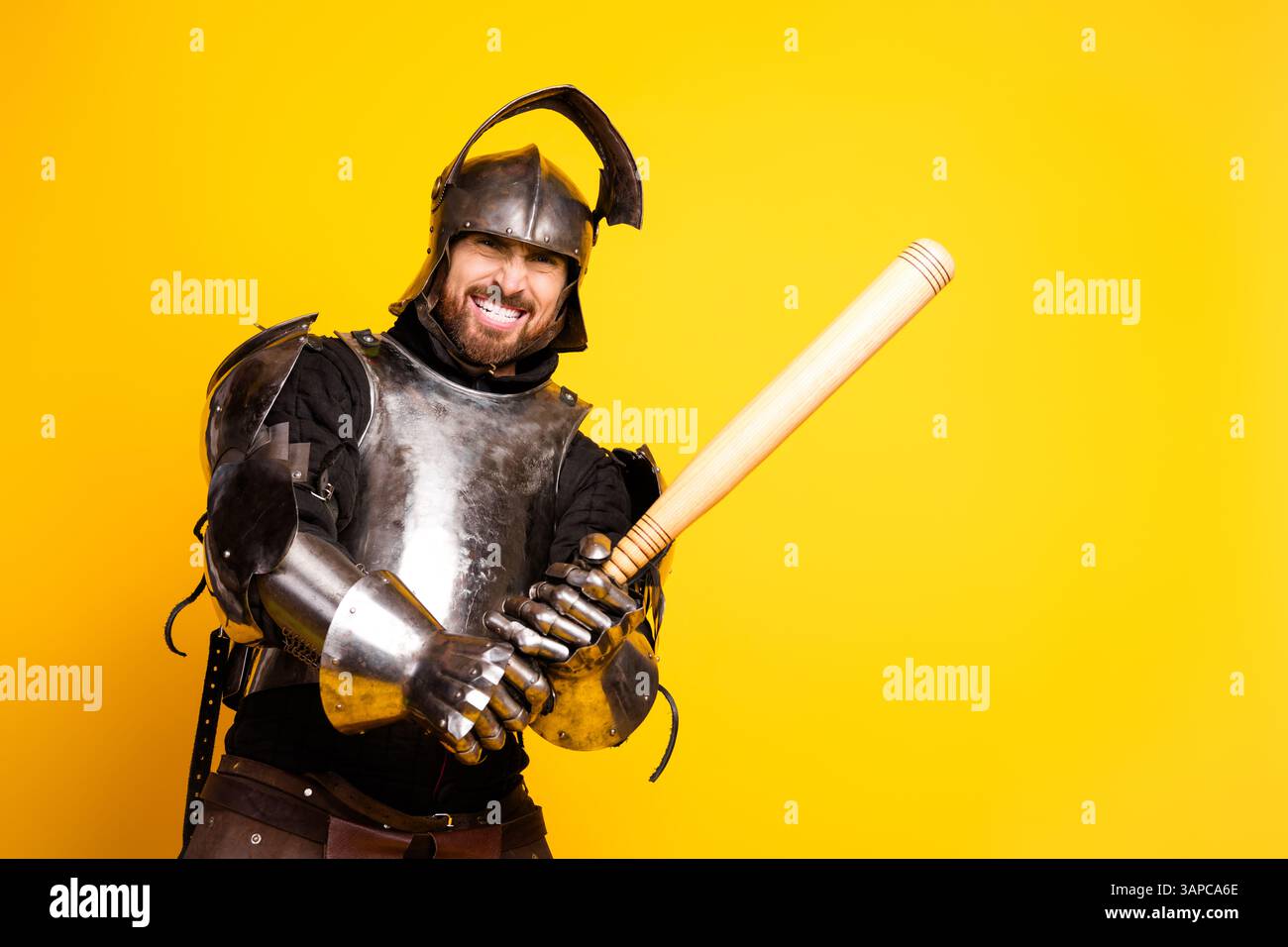 Medieval knight in armor holding a modern bat contrasting ancient and ...