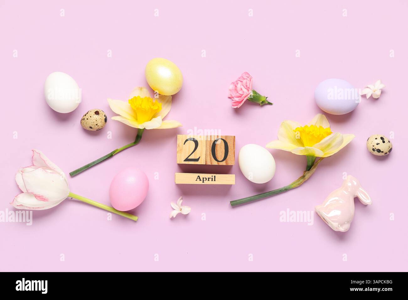 Wooden cube calendar with date 20 April, Easter eggs and beautiful ...