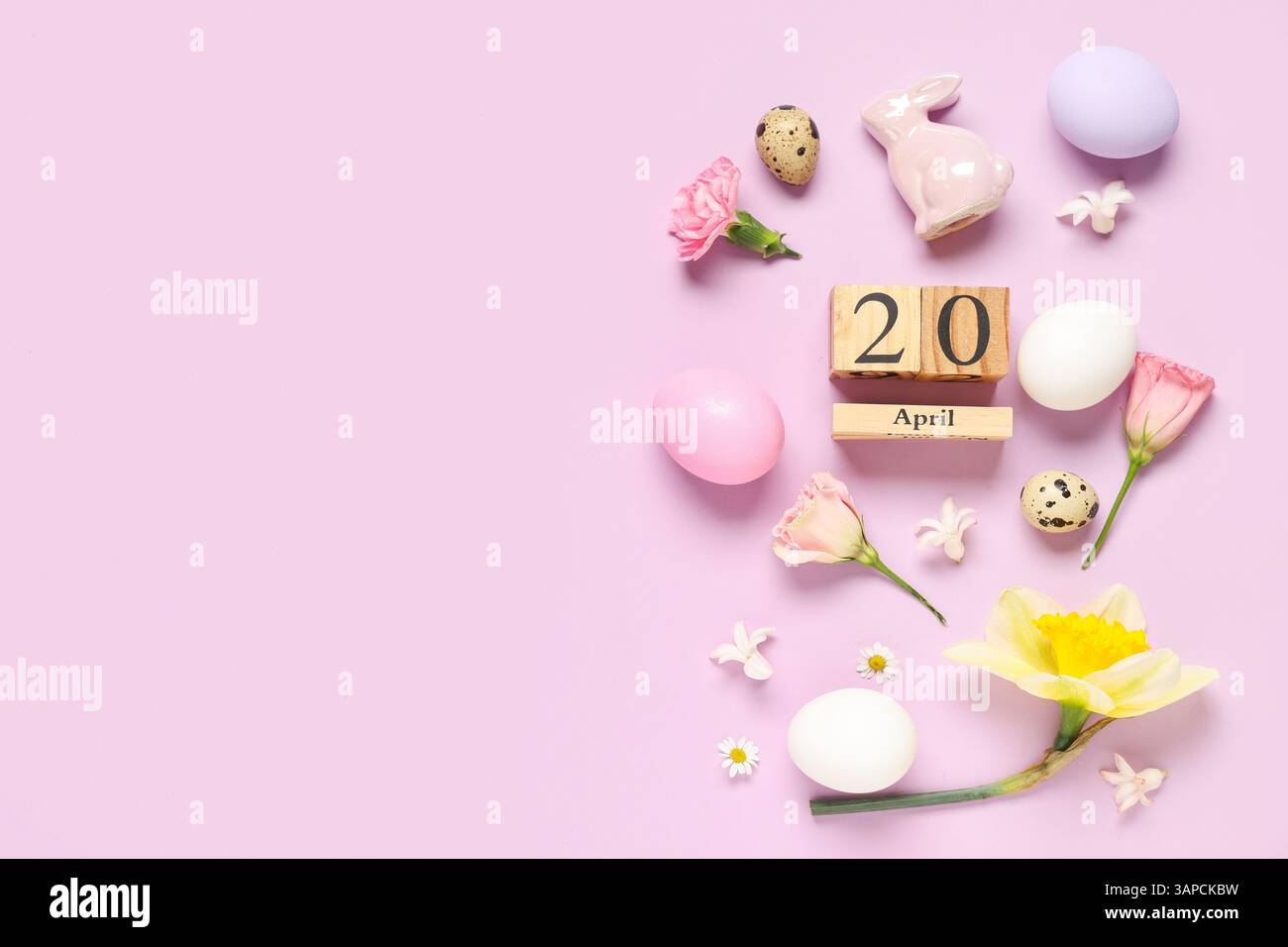 Wooden cube calendar with date 20 April, Easter eggs and beautiful ...