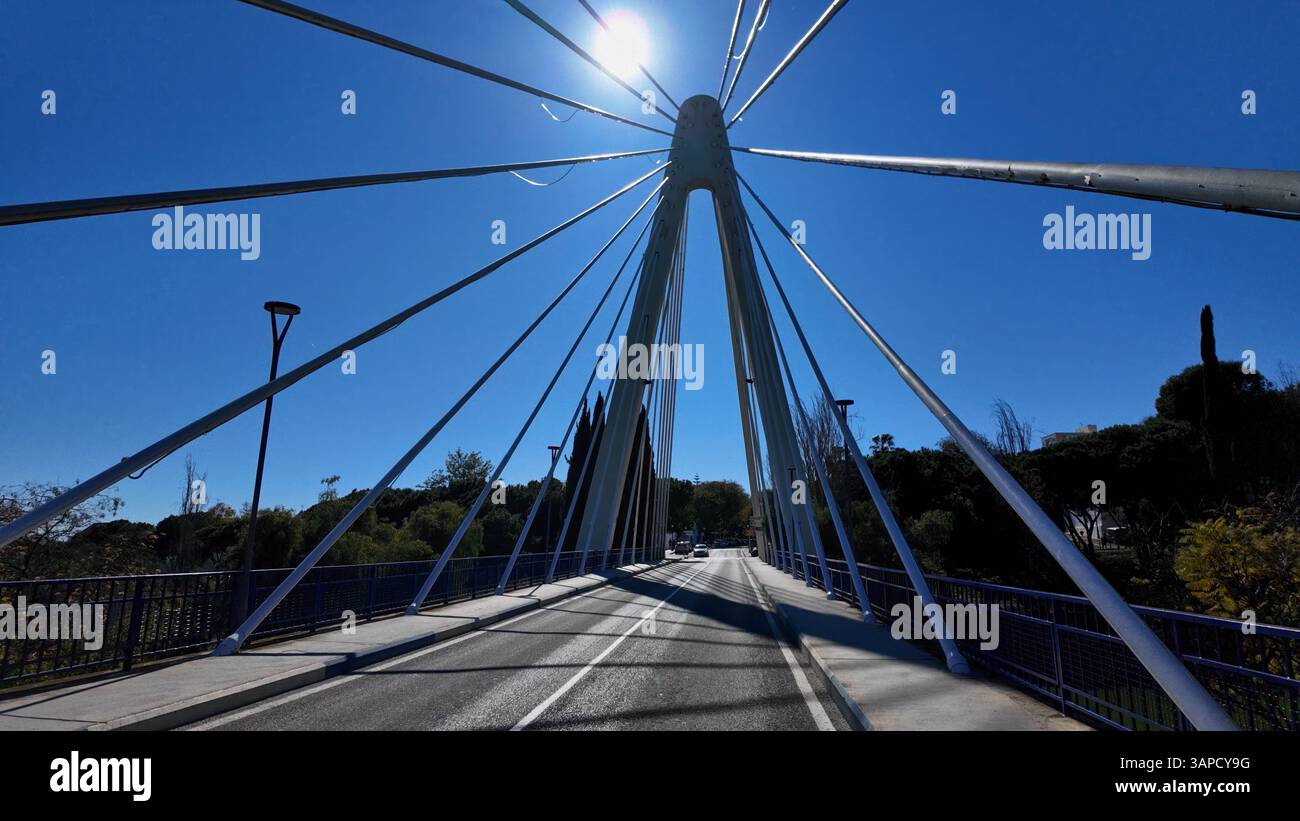 Modern cable stayed bridge in Marbella, Spain, connecting two sides of ...