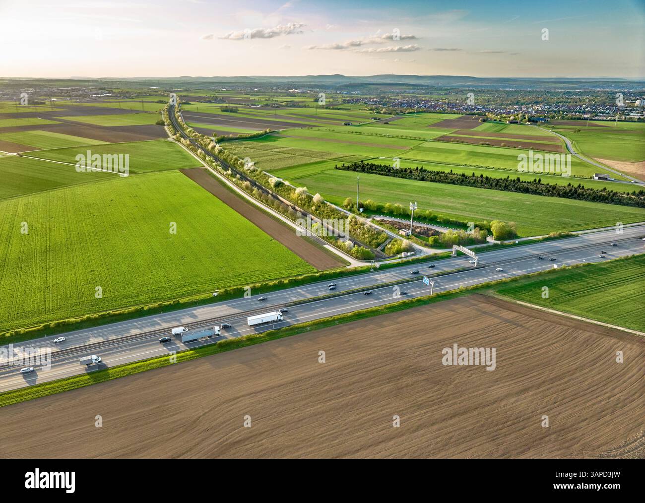 German highway A 81 and highspeed railway track crossing the fertile ...