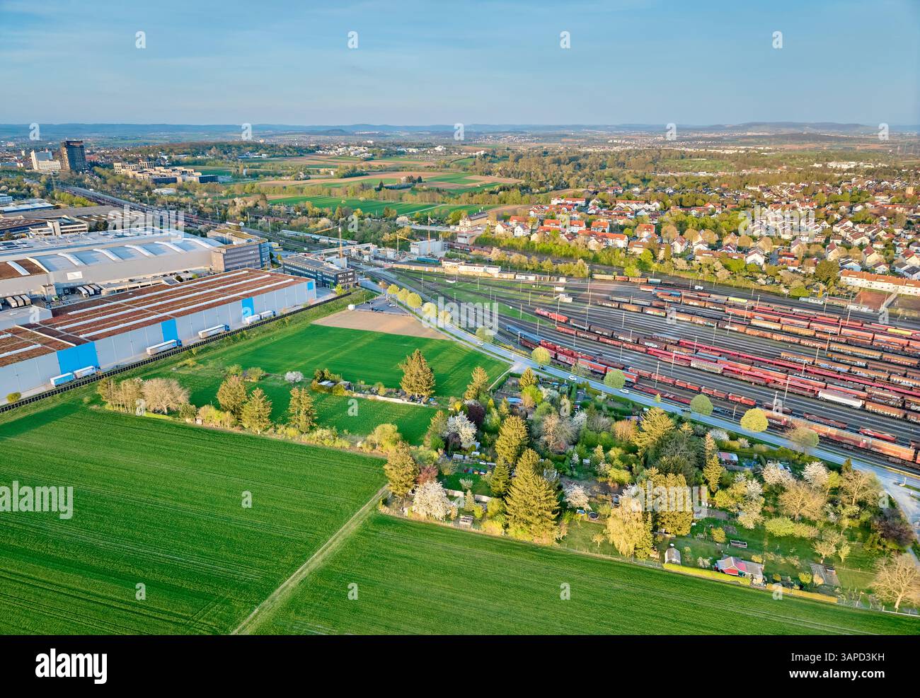 aerial view of a busy railroad container terminal and marshalling yard ...