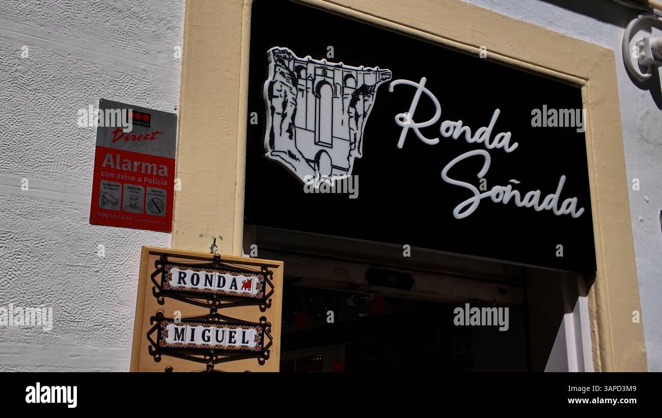 Storefront in Ronda, Spain, displaying a sign with the name Ronda ...