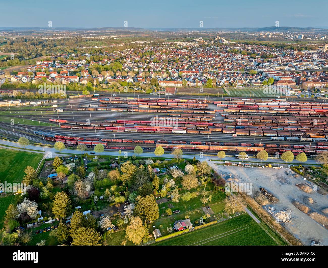aerial view of a busy railroad container terminal and marshalling yard ...