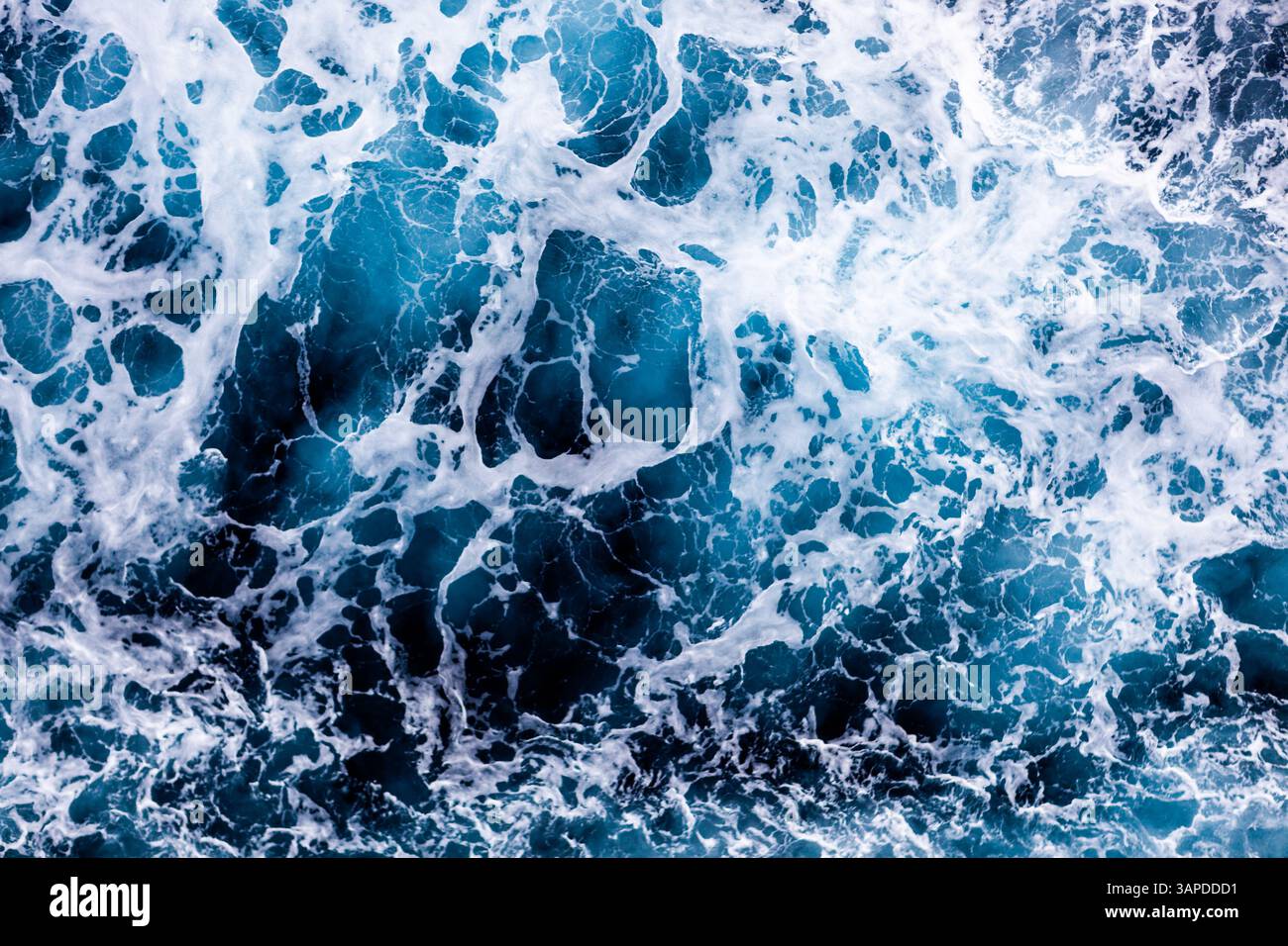 Ocean water surface texture. Aerial view of beautiful water with foam ...
